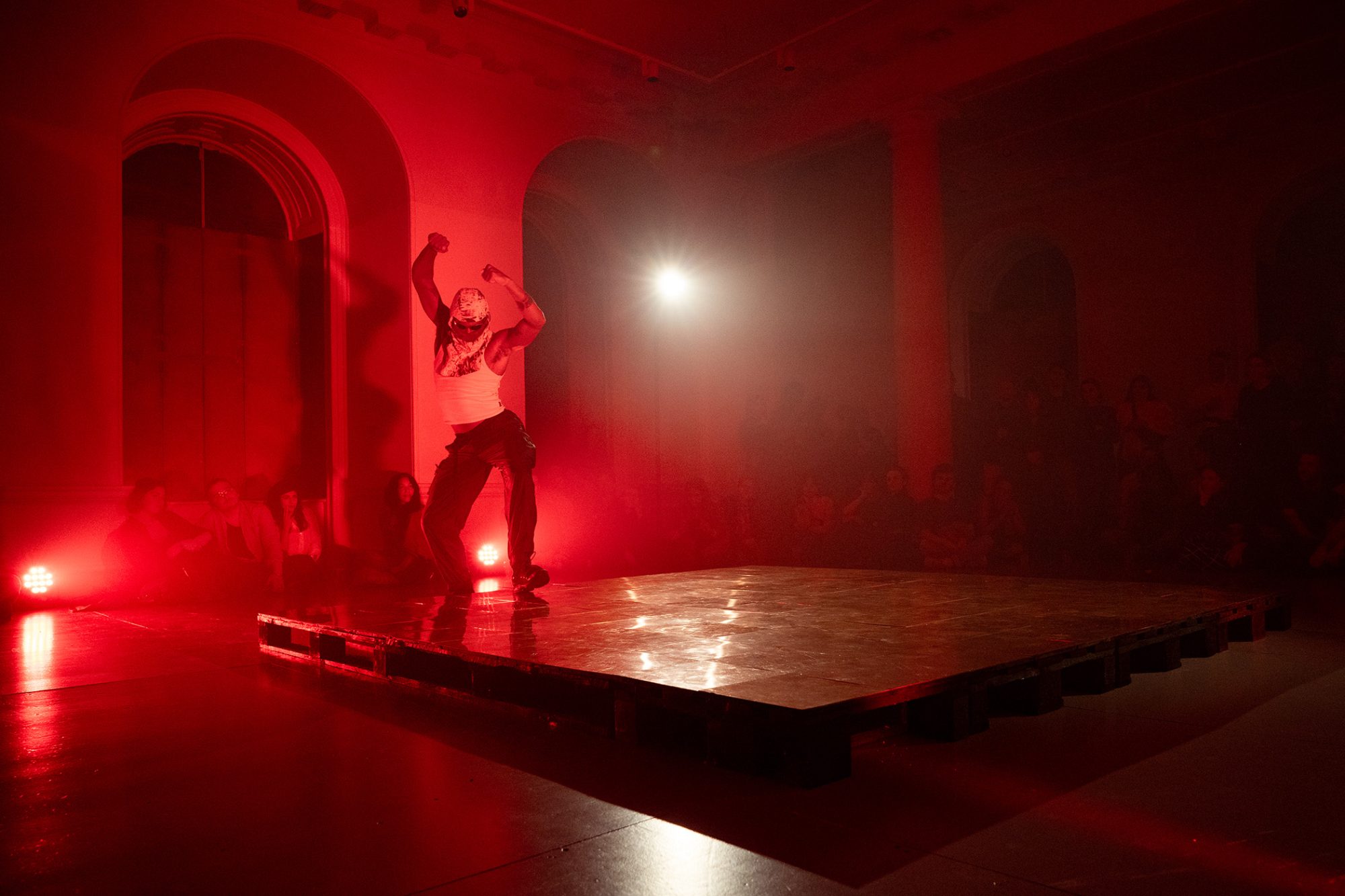 Roombas scattering hot pink glitter take stage at Asian Art Museum