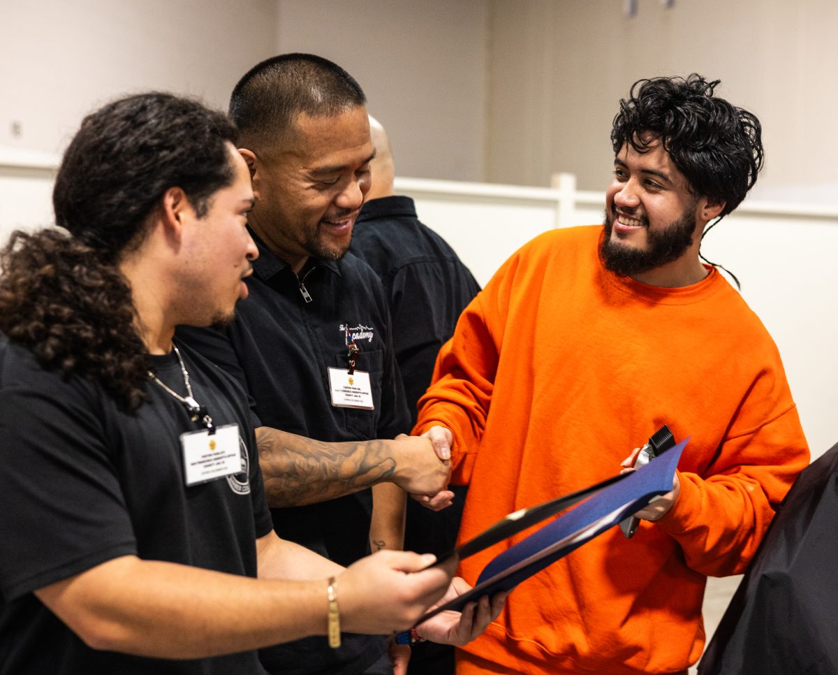 Inside S.F. jail, 13 barbers graduate, each with a different hairstyle