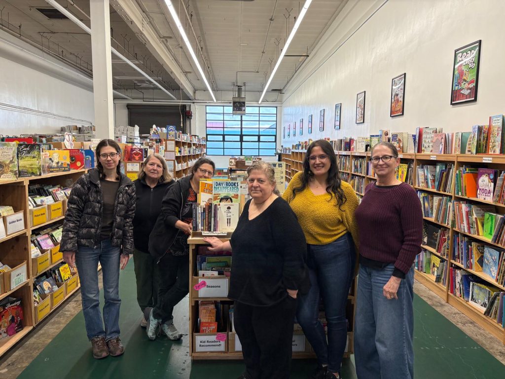 In a Bayview warehouse, kids scour shelves for 5 free books