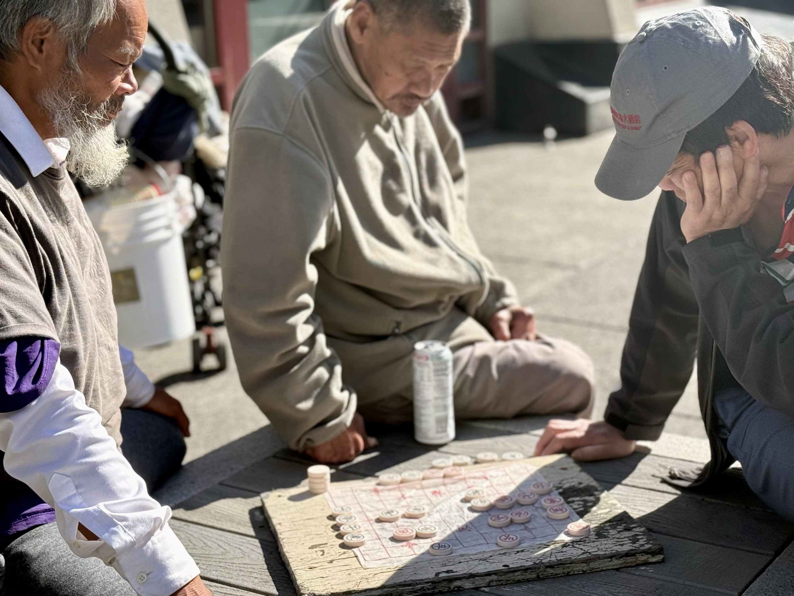 Where are the card-playing seniors of Portsmouth Square?